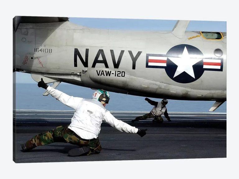US Navy Sailors Give The Thumbs Up Signal Before Launching A E-2C ...